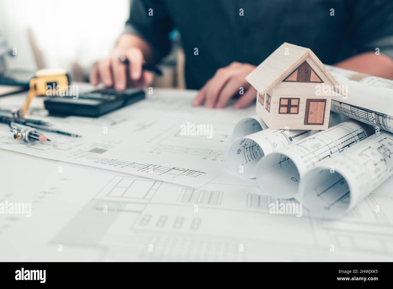Mini model house on roll blueprint plan and architector use calculate ...