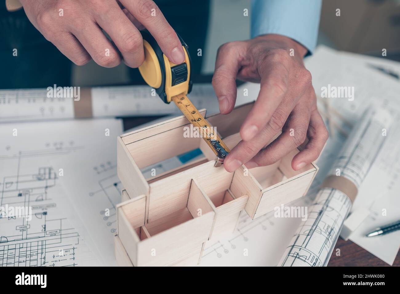 Architect engineer tape measure for check and measure house model on ...