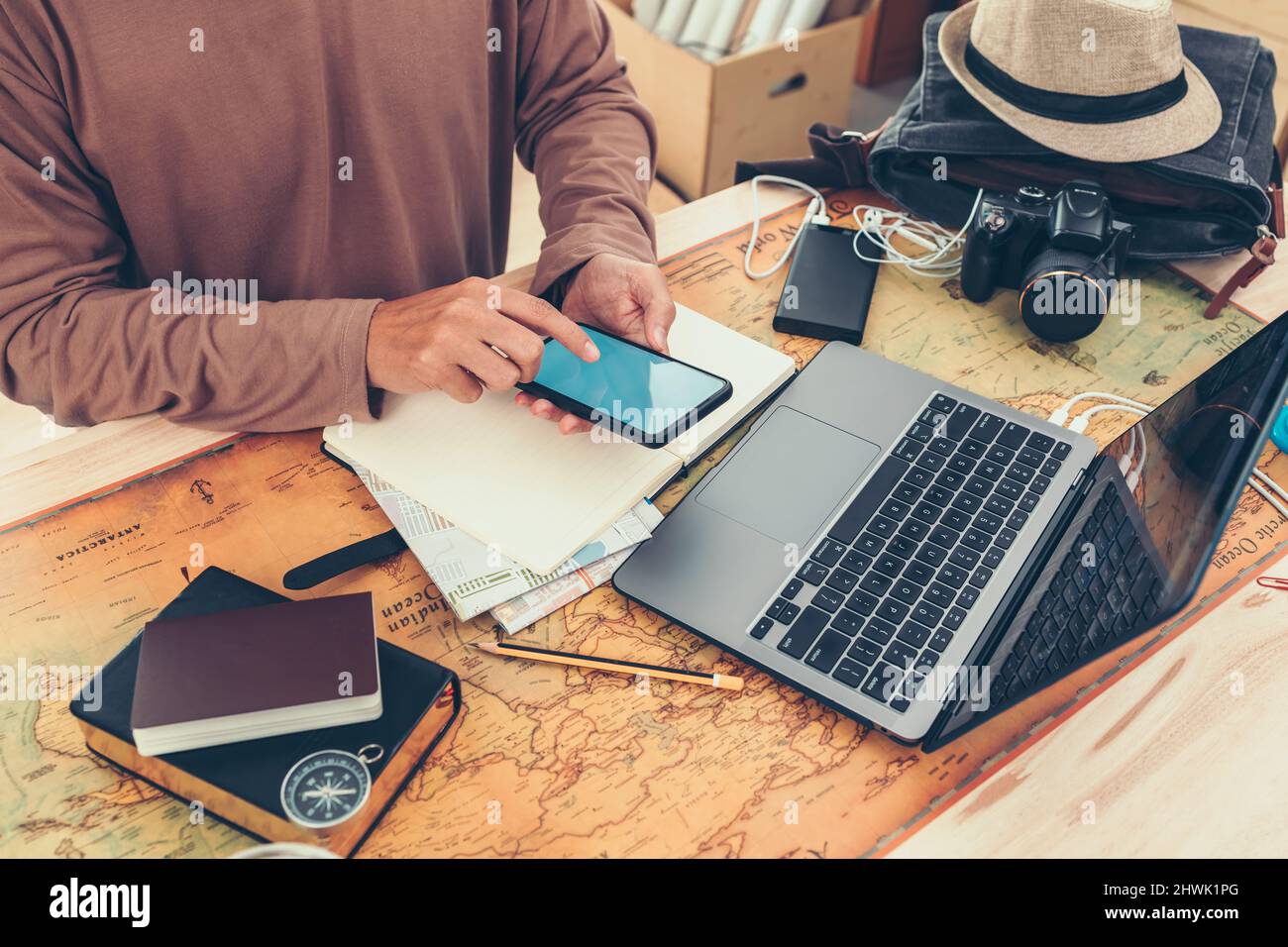 Planning a trip laptop map hi-res stock photography and images - Alamy