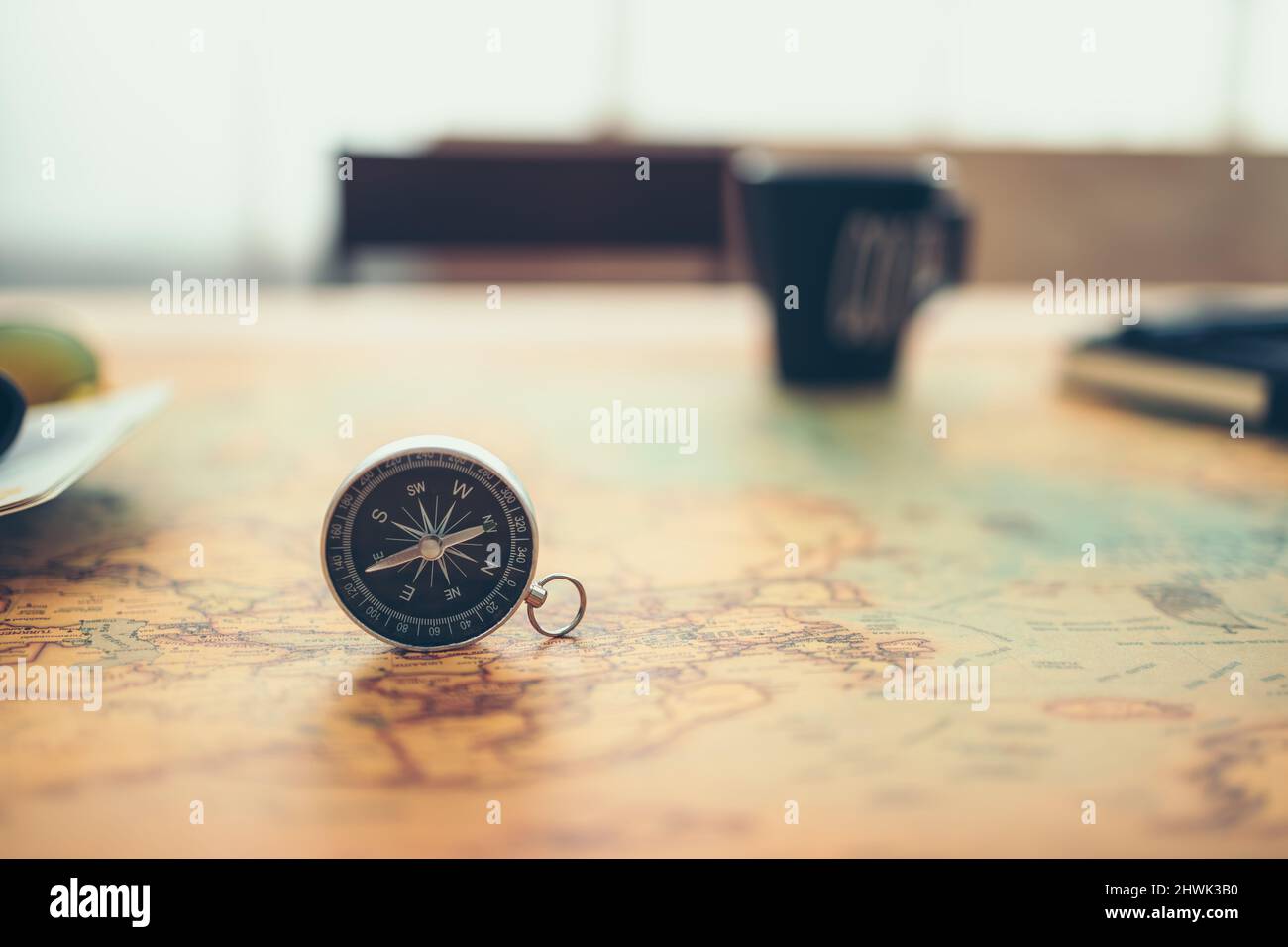 Magnetic compass on world map. Travel , Adventure and Discovery concept ...