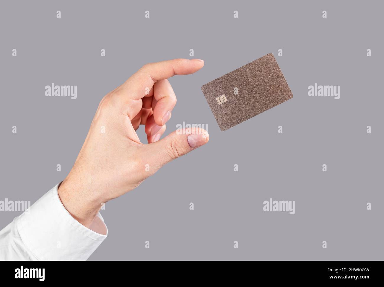 Hand and levitating credit card. Online shopping and cashless payment ...
