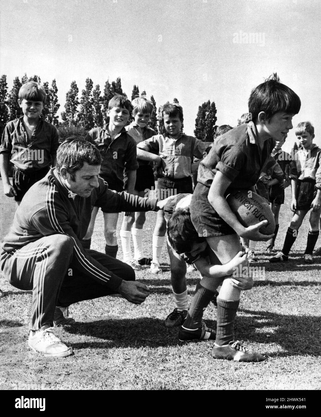 Ray Williams, WRU coaching organiser, and youngsters at a coaching ...
