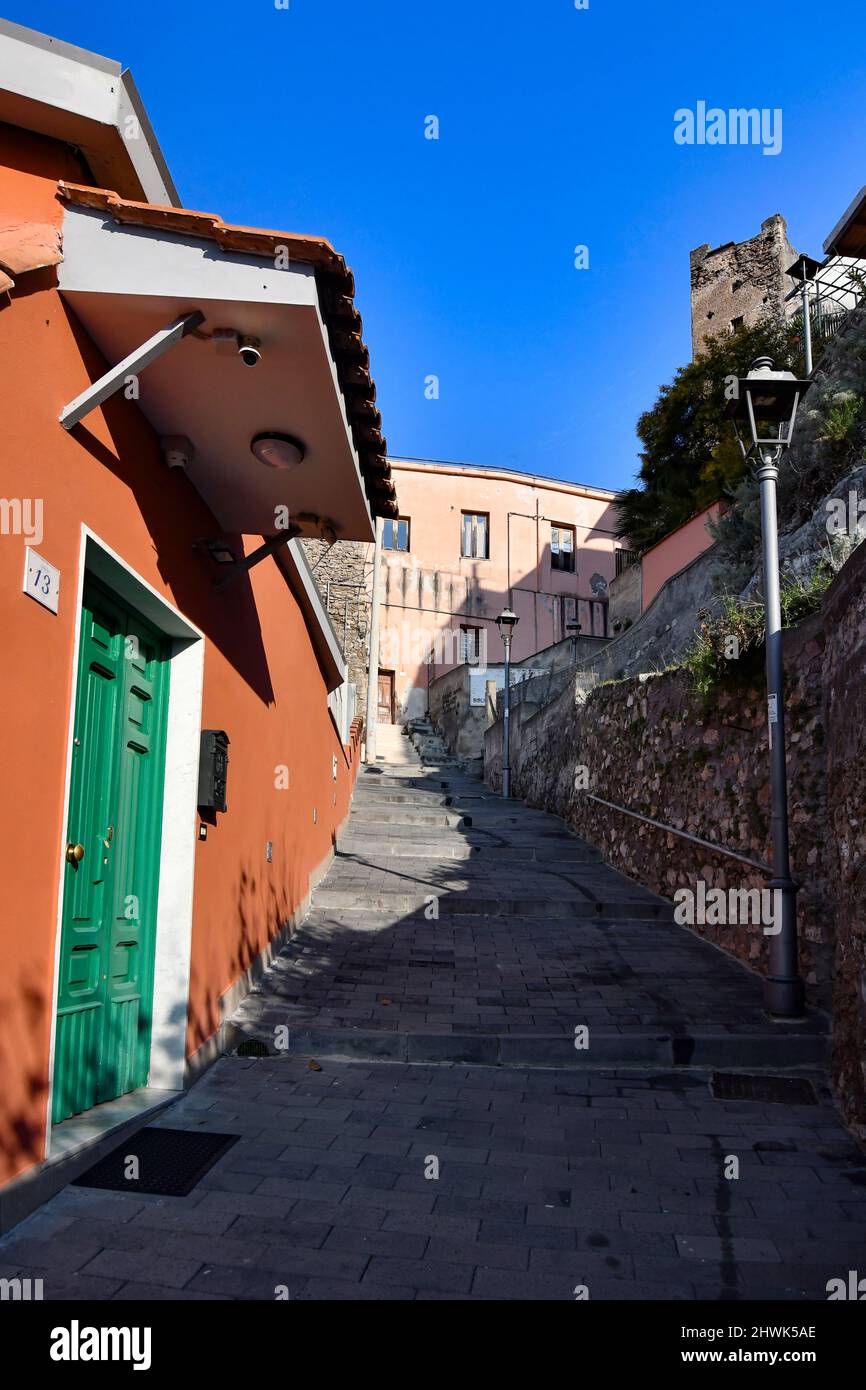 A narrow street among the old stone houses of Sarno, town in Salerno ...