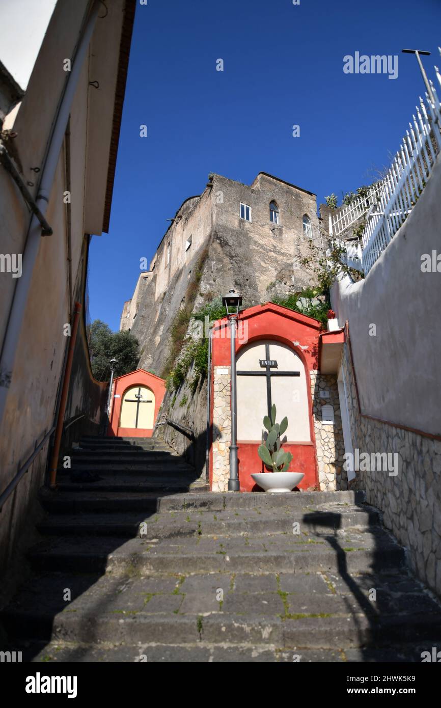 A narrow street among the old stone houses of Sarno, town in Salerno ...