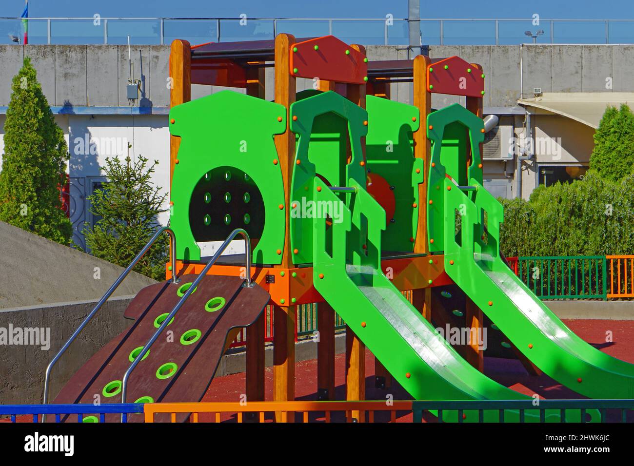Modern children playground wooden tower slides all in one Stock Photo ...