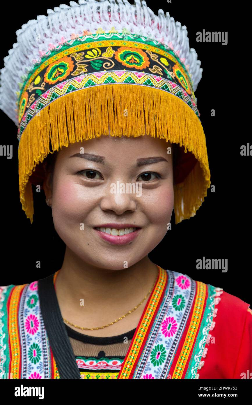 China, Guizhou, Dragon Palace Scenic Area. Young Woman in Traditional ...