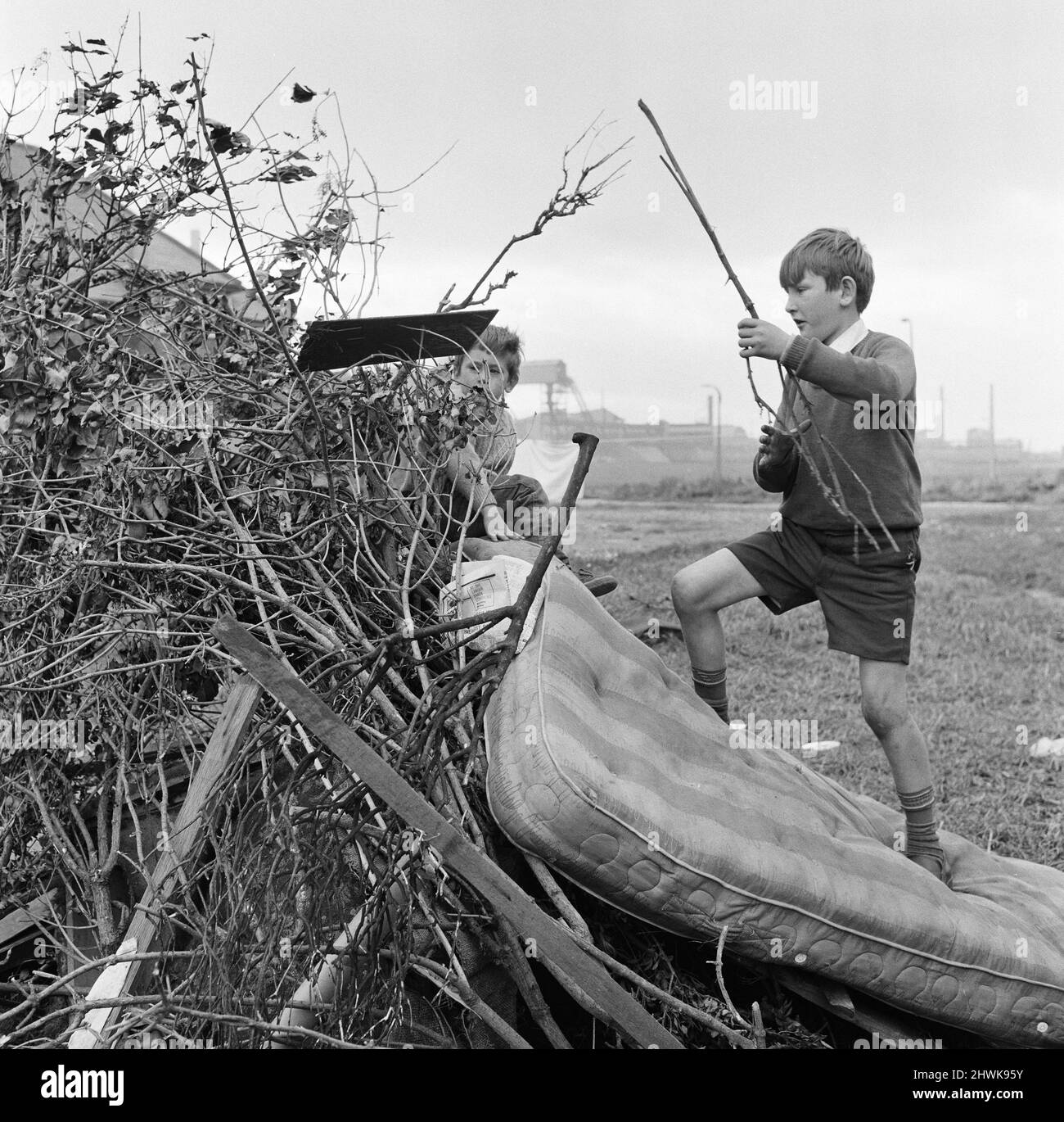 Children building a bonfire on Teesside. 1971 Stock Photo - Alamy