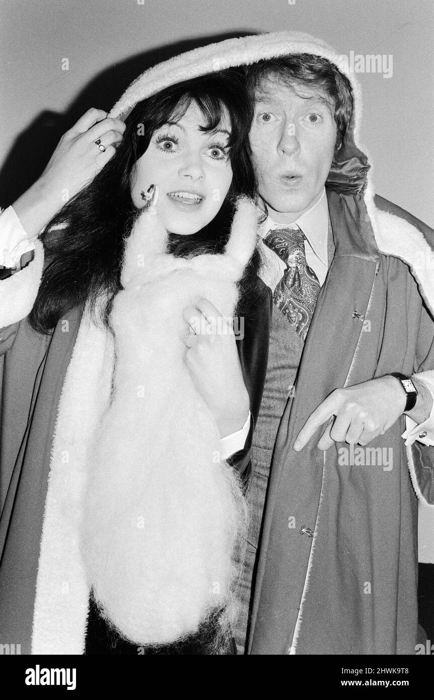 Actress Madeline Smith poses with Michael Crawford dressed in Father ...
