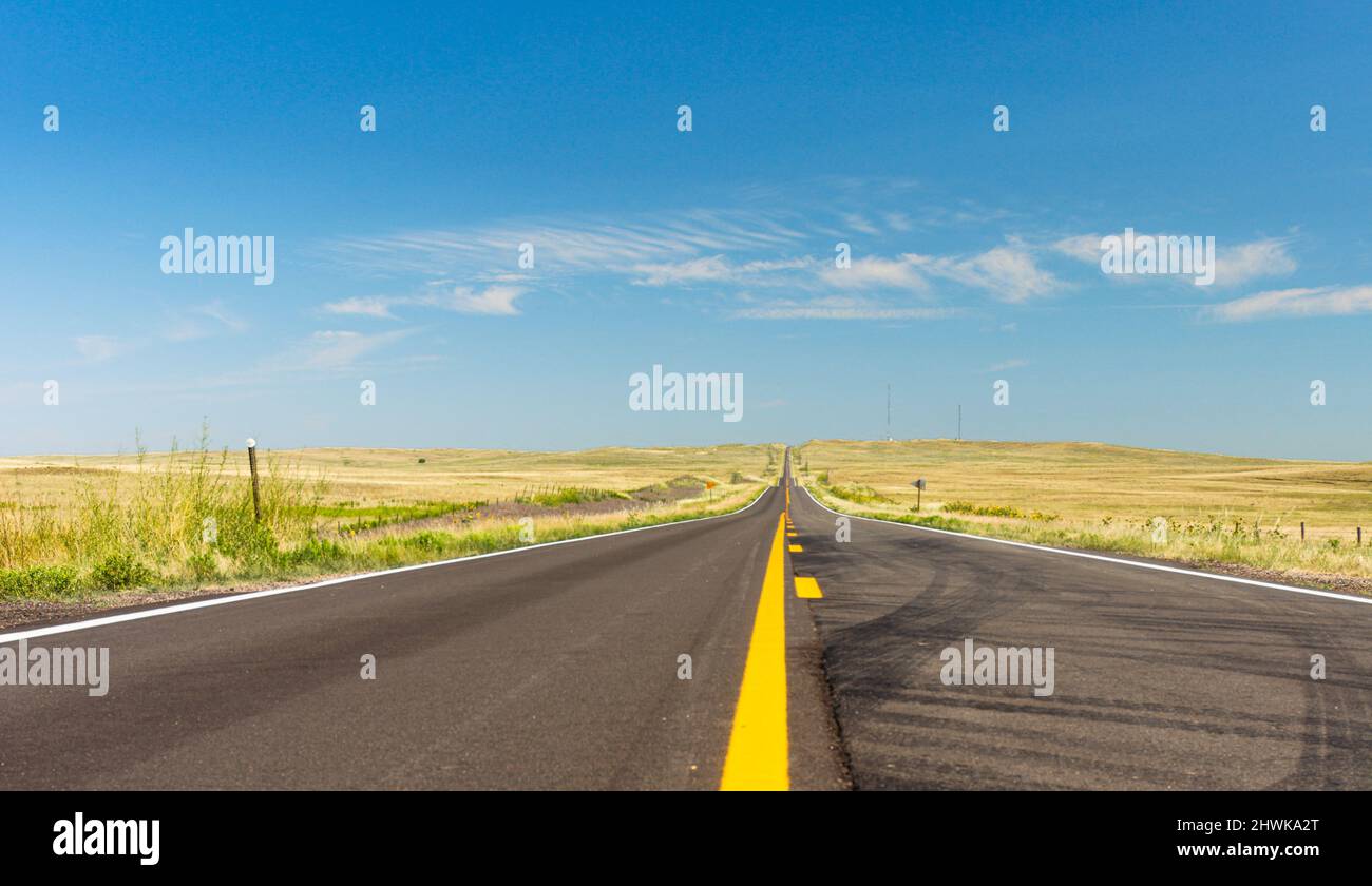 Straight Highway leading through the Gret Plains in the USA Stock Photo ...
