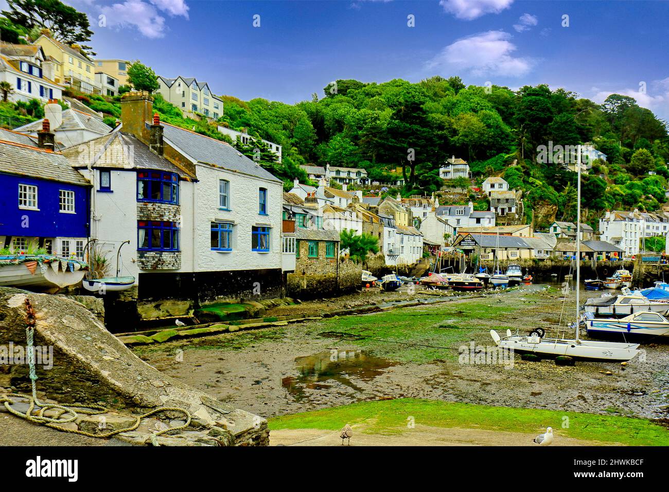 Tides out in the harbour at Polperro Stock Photo - Alamy