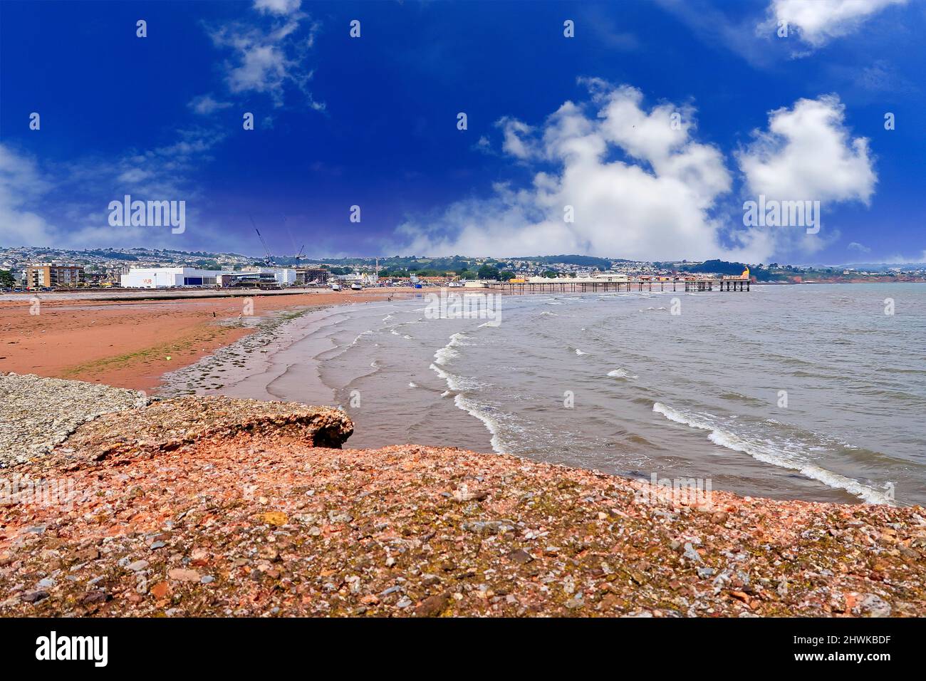 Pebbles and sand on the beach at Torbay Stock Photo - Alamy