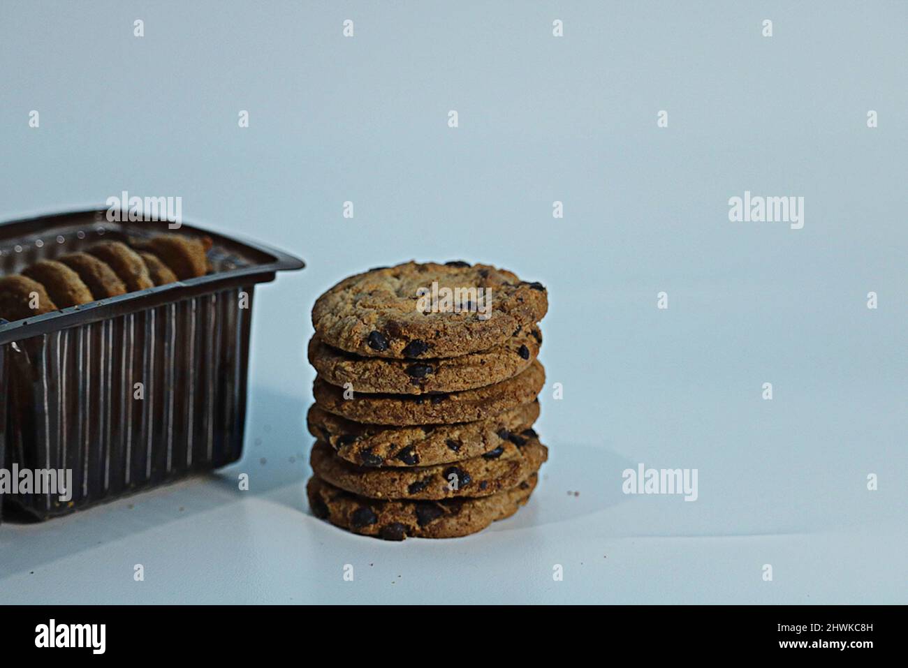 cookie time: oversized chocolate chip cookies on white background Stock ...