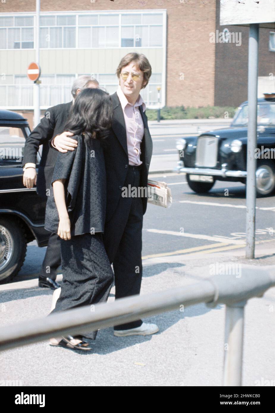 Former member of The Beatles pop group John Lennon with his wife Yoko Ono at Heathrow Airport ...