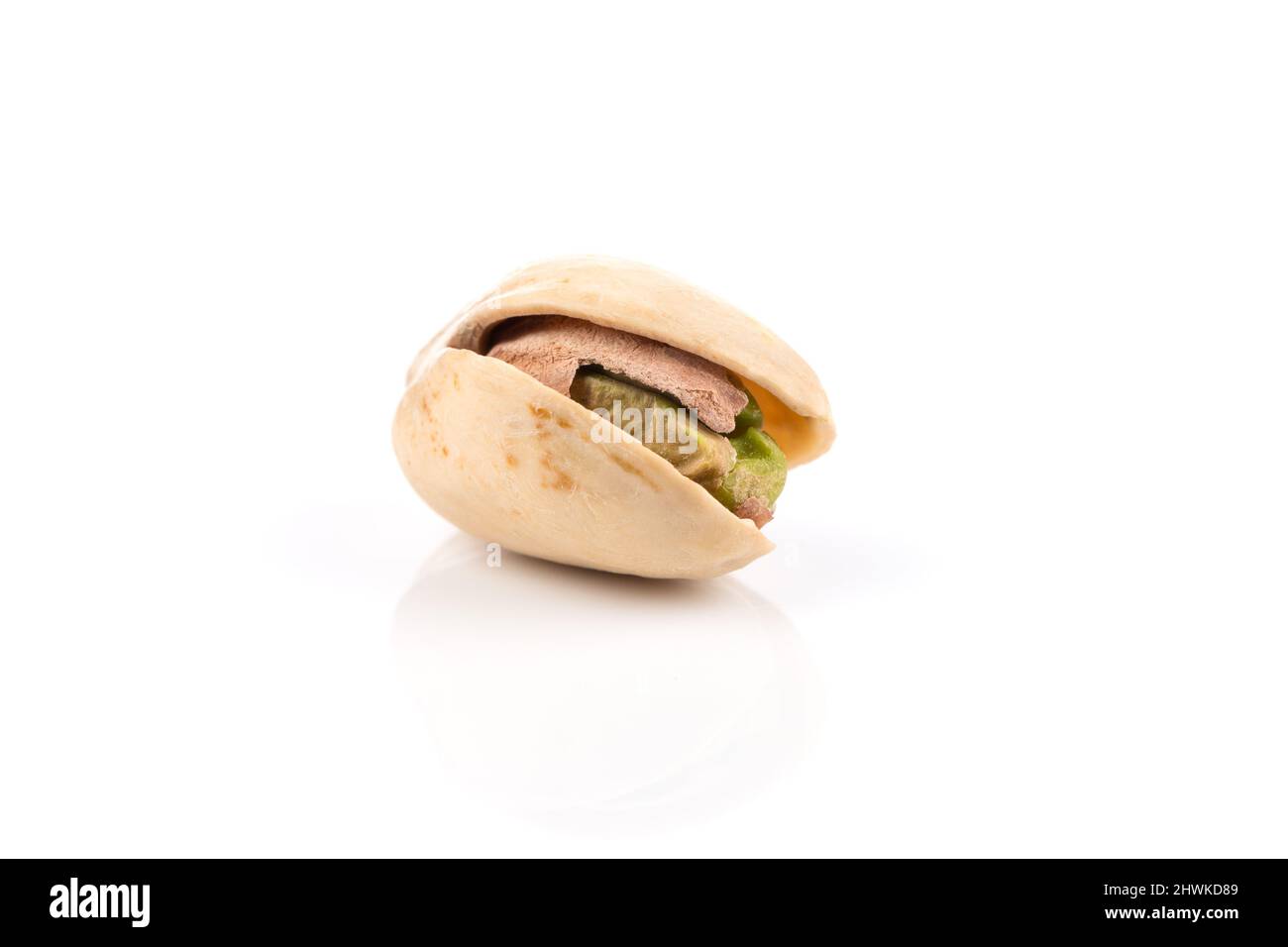 pistachio nut in shell close up isolated on white background Stock ...