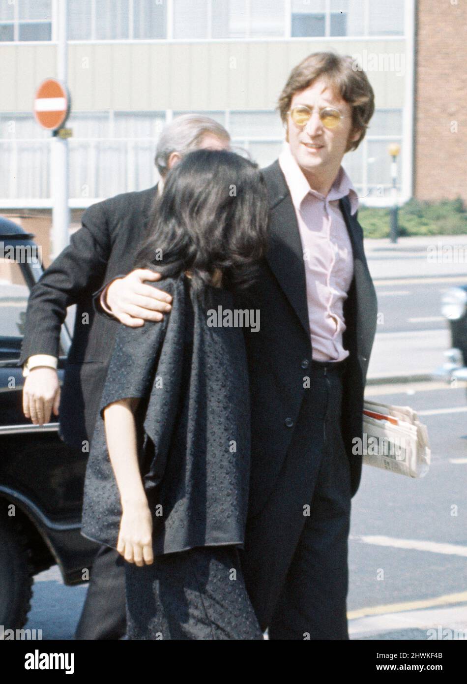 Former member of The Beatles pop group John Lennon with his wife Yoko Ono at Heathrow Airport ...