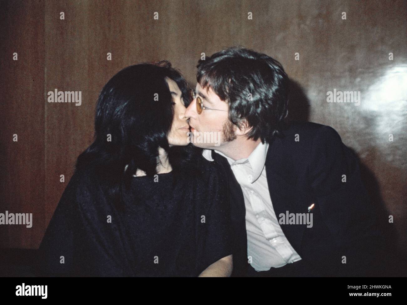 Former member of The Beatles pop group John Lennon with his wife Yoko Ono at Heathrow Airport ...