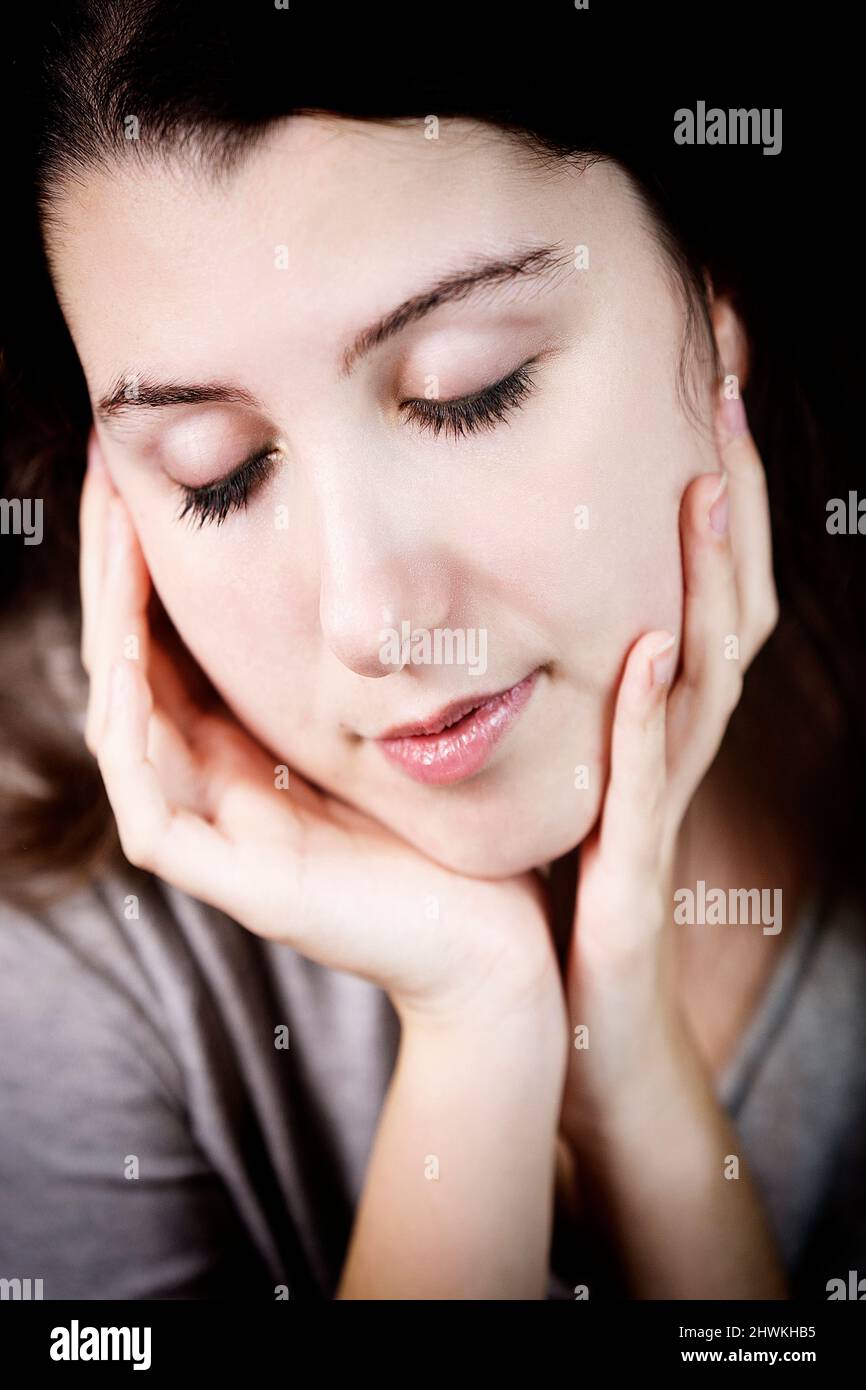 young teenager in sad attitude III Stock Photo - Alamy