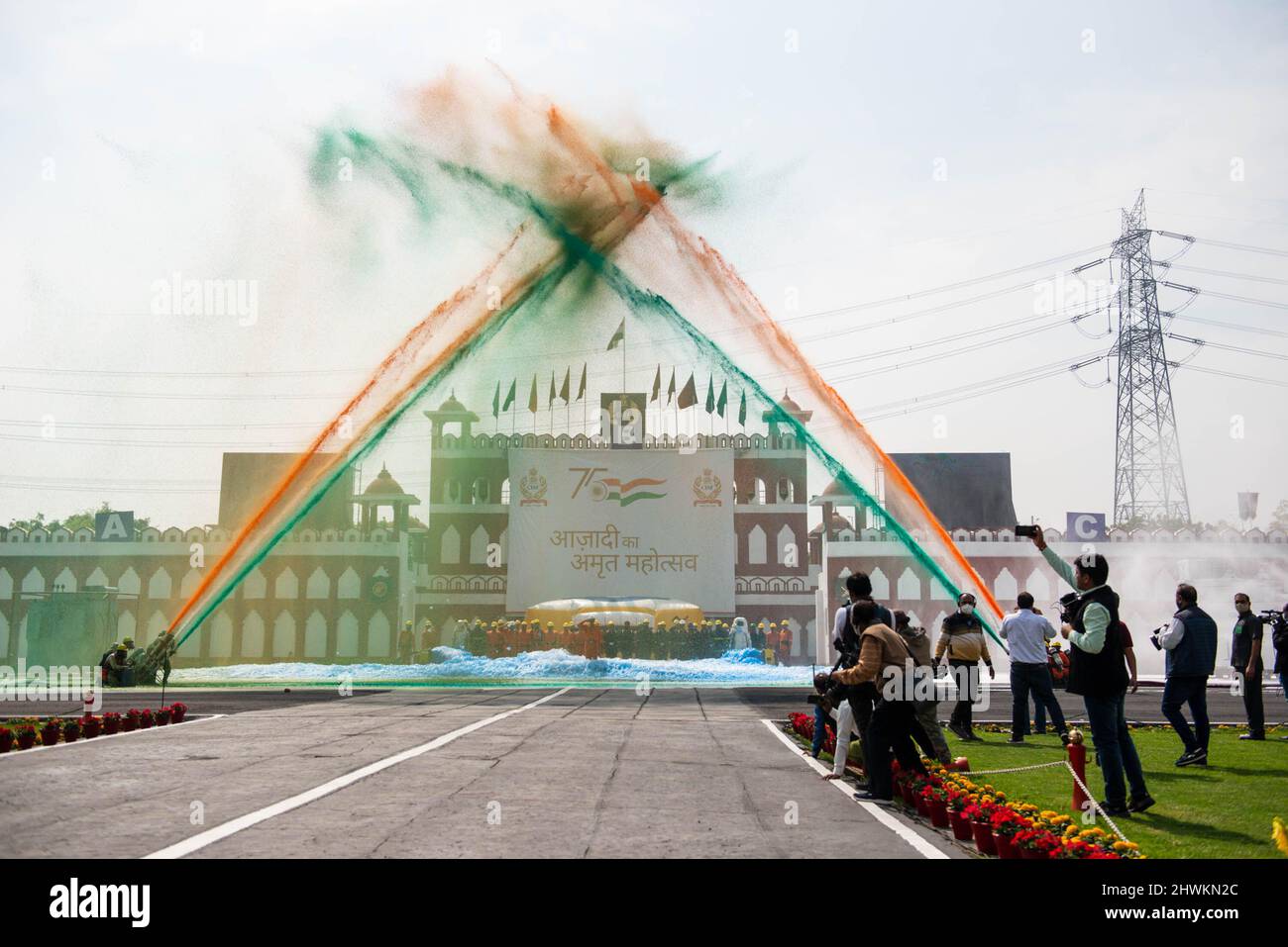 Ghaziabad, India. 06th Mar, 2022. CISF fire wing sprays tricolor water ...