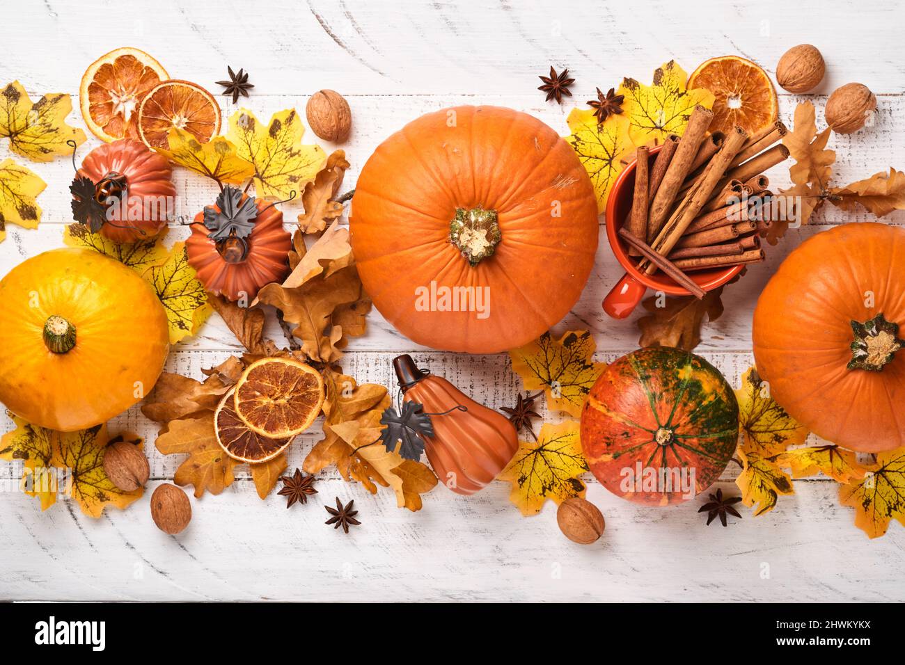 Pumpkin. Autumn food background with cinnamon, nuts and seasonal spices ...