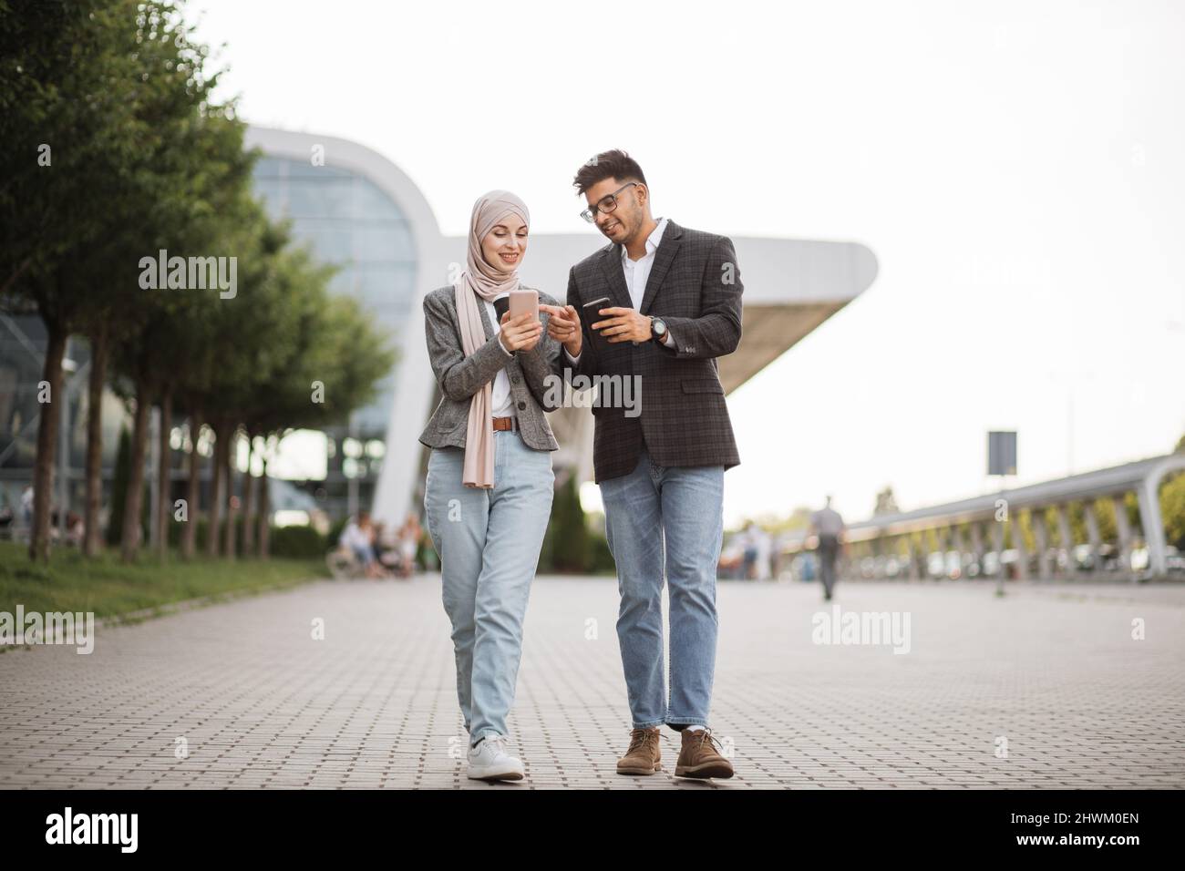 Arab man meeting friends hi-res stock photography and images - Alamy