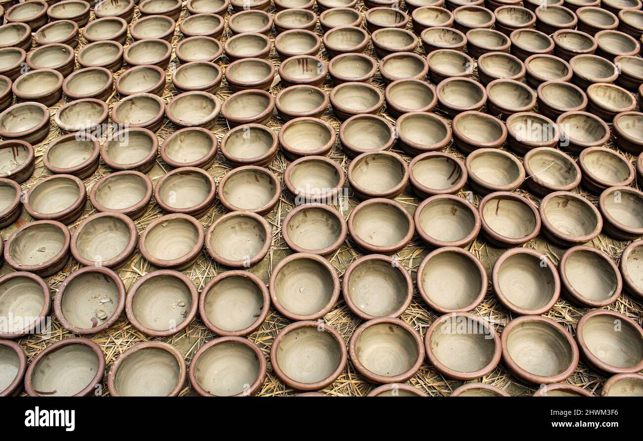 Best pottery work by woman,pottery making With clay Stock Photo - Alamy