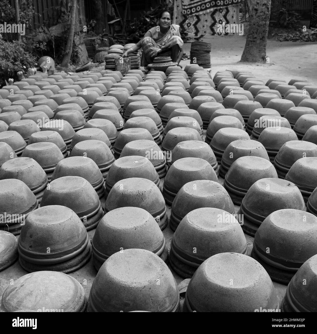 Best pottery work by woman,pottery making With clay Stock Photo - Alamy