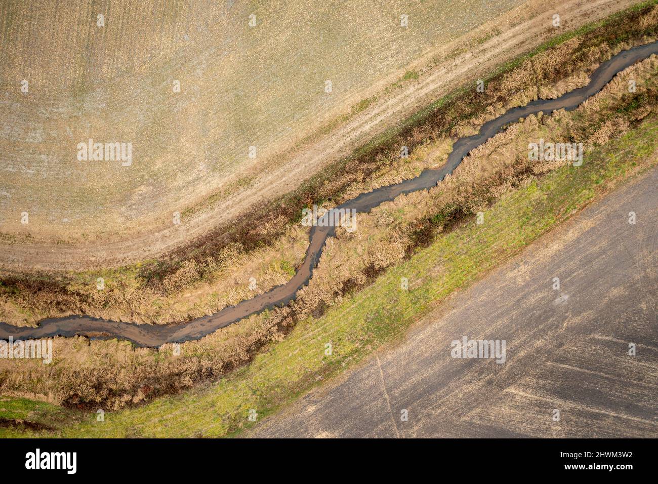 Aerial view of stream on farm Stock Photo - Alamy