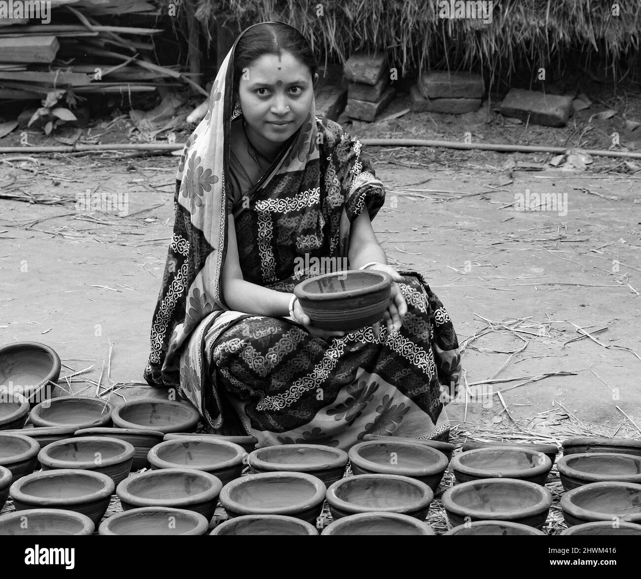 Best pottery work by woman,pottery making With clay Stock Photo - Alamy