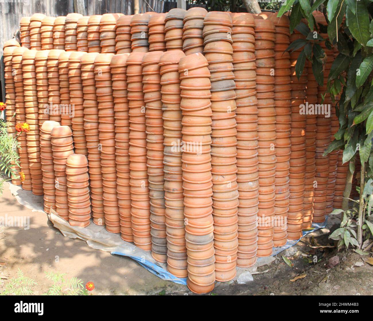 Best pottery work by woman,pottery making With clay Stock Photo - Alamy