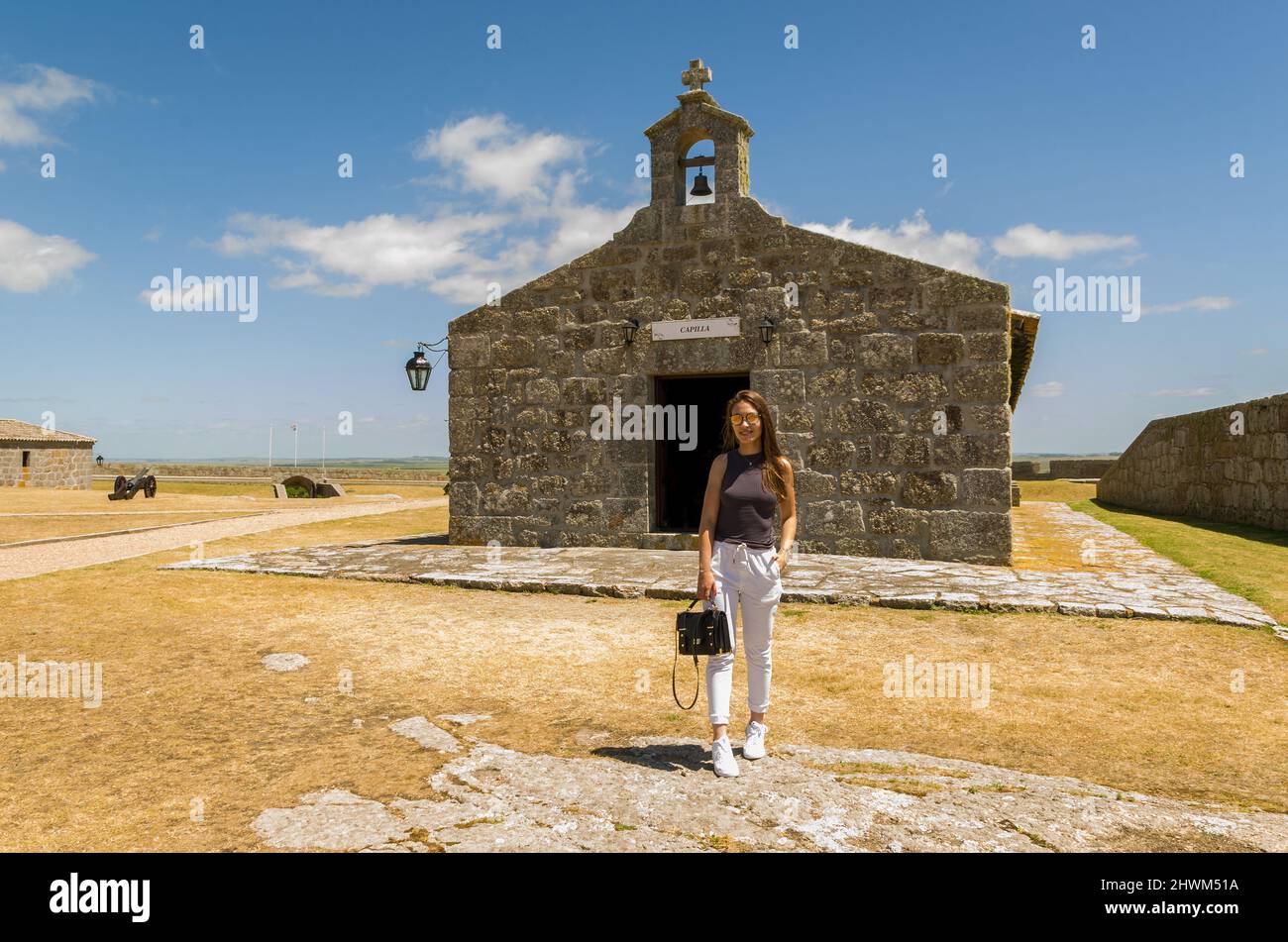 Female tourist visiting Forte de Santa Tereza in Uruguay, an important ...
