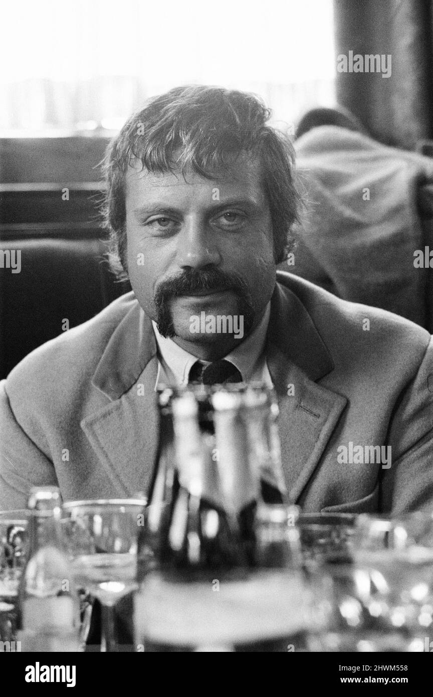 Oliver Reed, British actor, enjoys a few drinks at his local pub, The ...