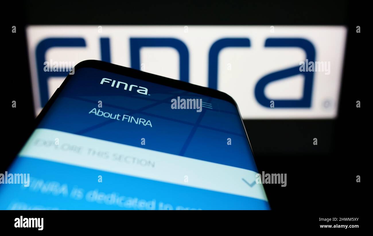 Smartphone with webpage of US Financial Industry Regulatory Authority ...