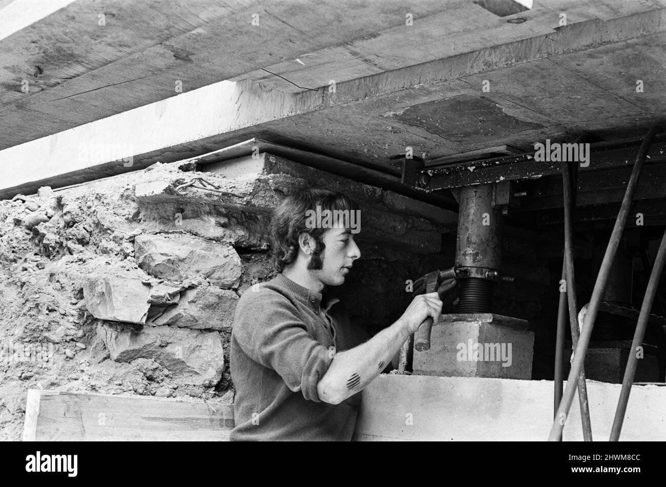 The lifting of the Old Shambles in the centre of Manchester begins with ...