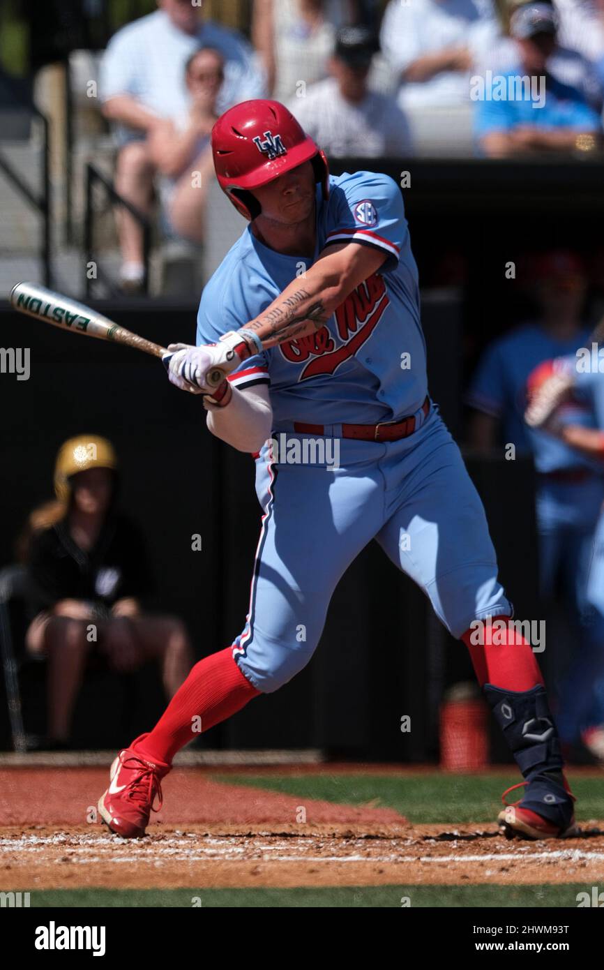 MARCH 06, 2022: Ole Miss player Kemp Alderman (#12) swings at a pitch ...