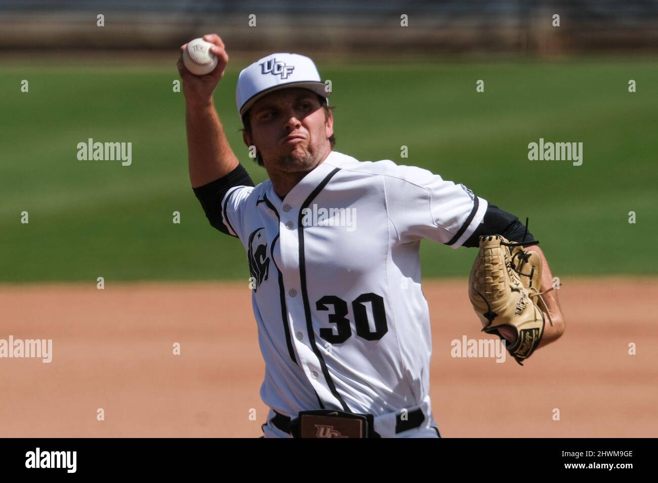 MARCH 06, 2022: UCF Pitcher Kyle Kramer (#30) delivers a pitch against ...