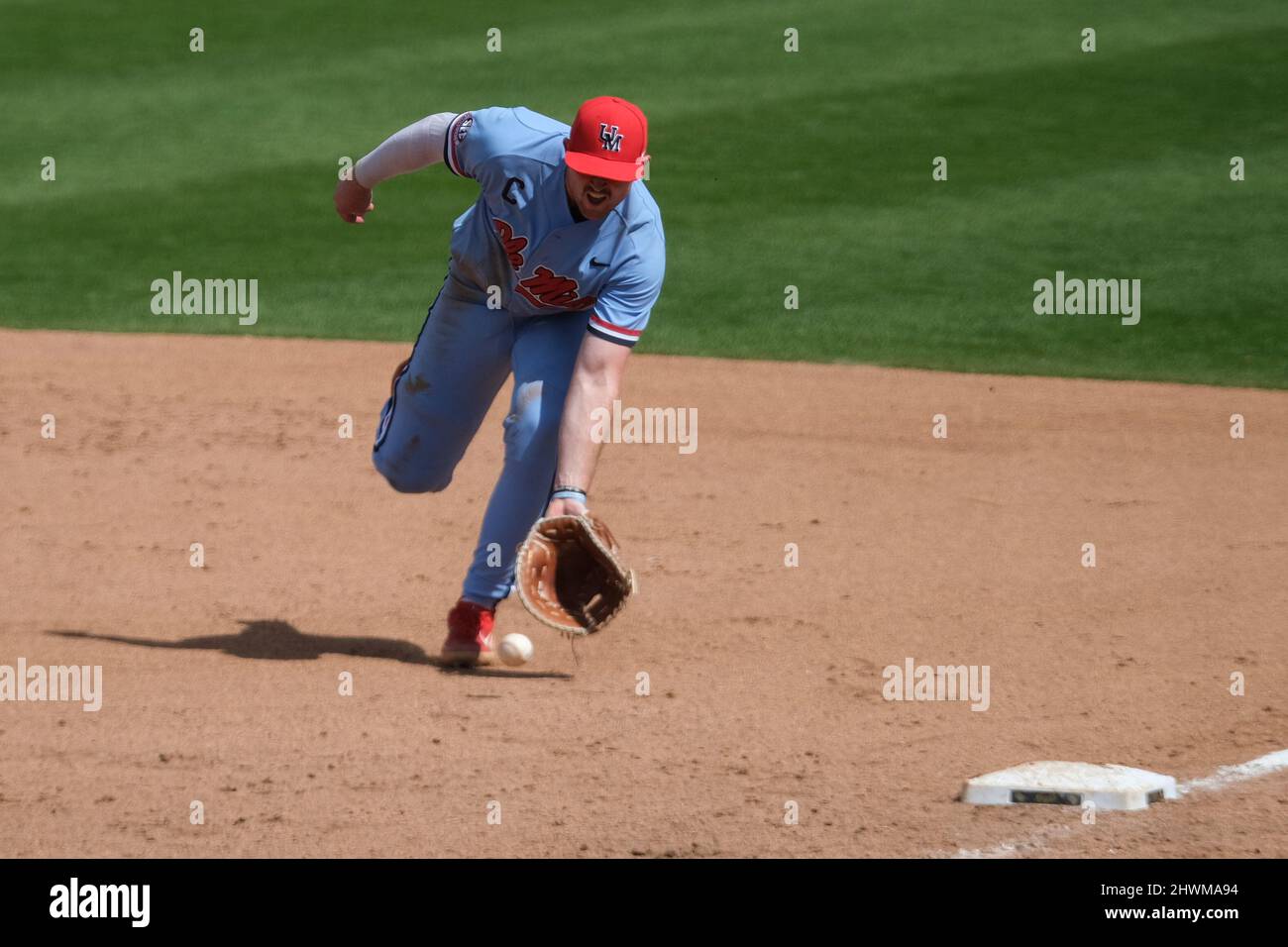 MARCH 06, 2022: Ole Miss First Baseman Tim Elko (#25) fields a ball at ...