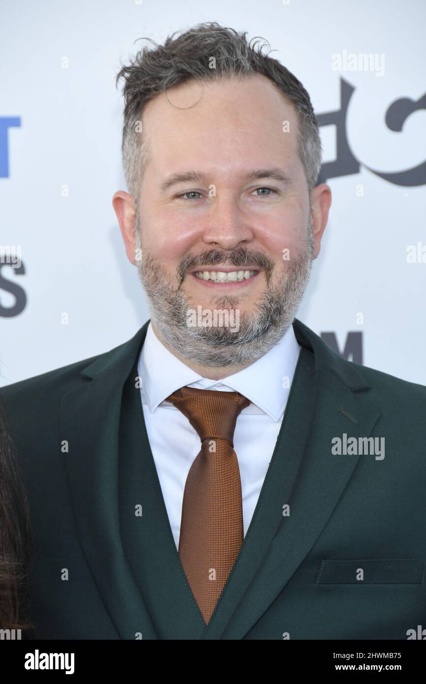 Thomas Mahoney arrives at the 2022 Film Independent Spirit Awards held ...