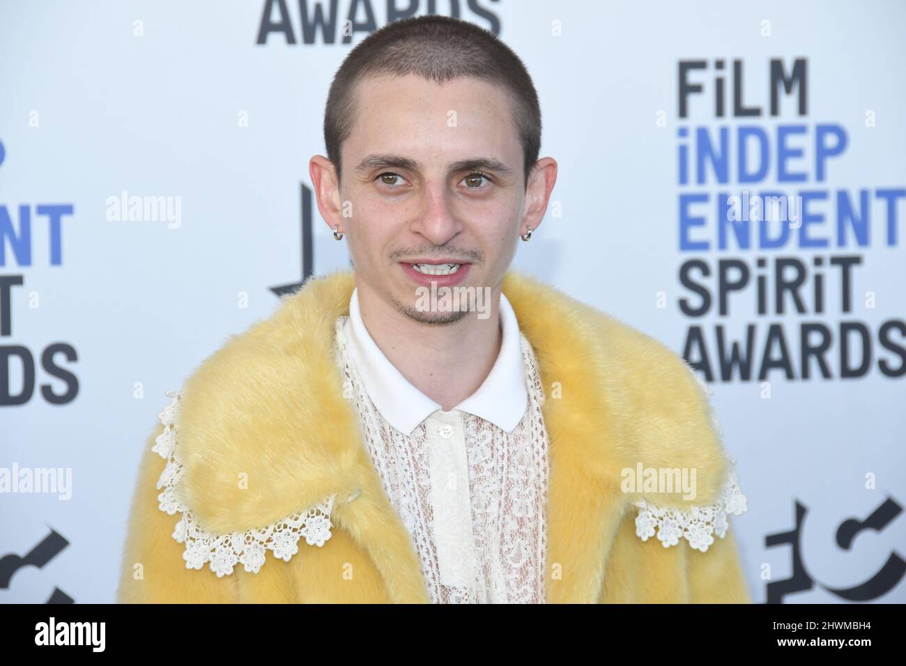 Moises Arias arrives at the 2022 Film Independent Spirit Awards held at ...