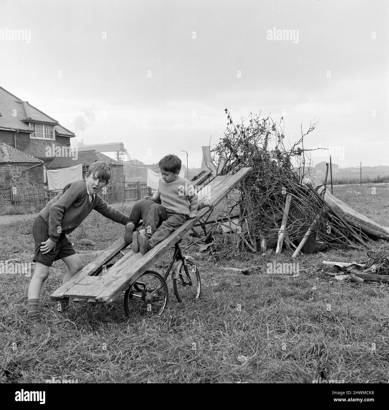 Children building a bonfire on Teesside. 1971 Stock Photo - Alamy