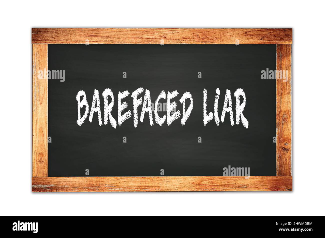 BAREFACED LIAR text written on black wooden frame school blackboard ...