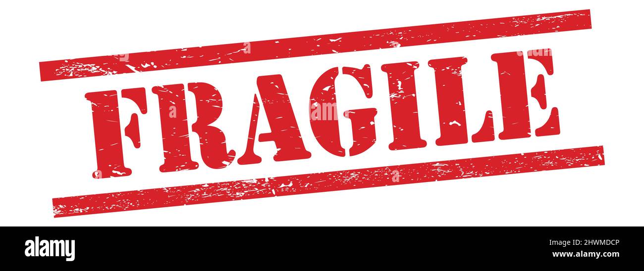 FRAGILE text on red grungy vintage rubber stamp Stock Photo - Alamy