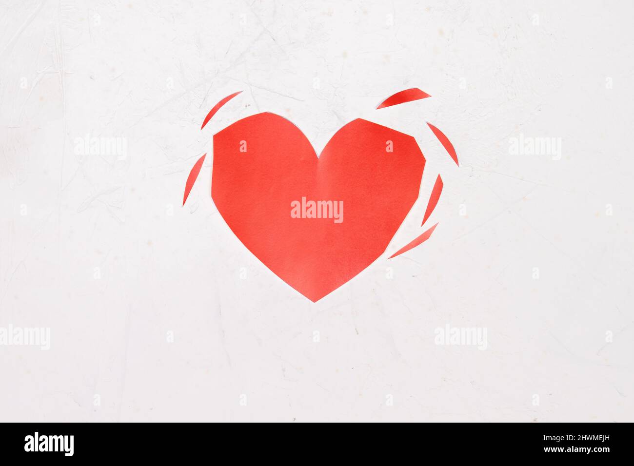 torn heart on a white background. Cheating, disappointment in love ...