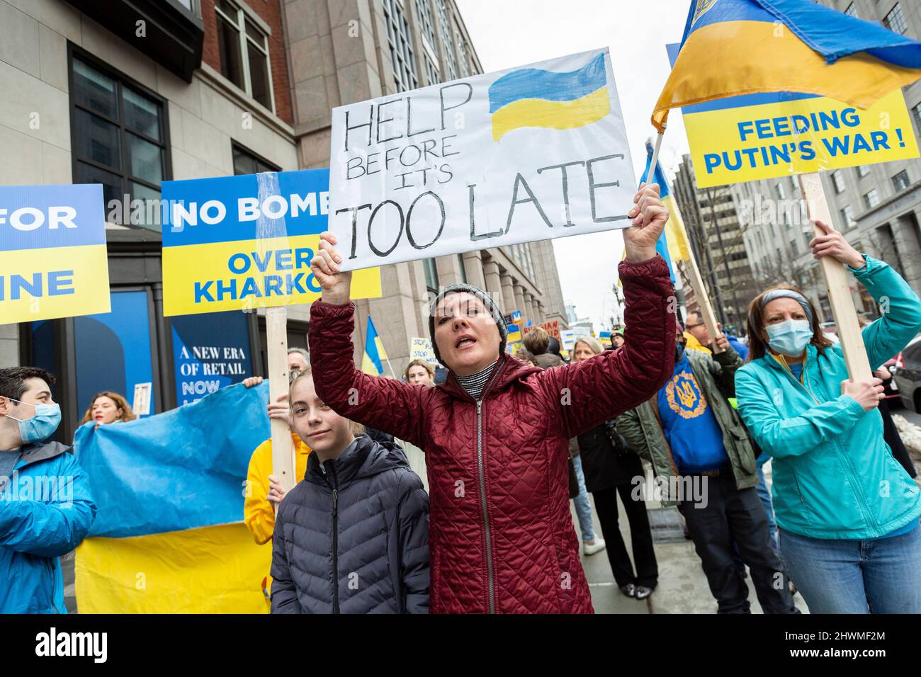 March 6, 2022. Boston, MA. People marched down Boylston Street in ...