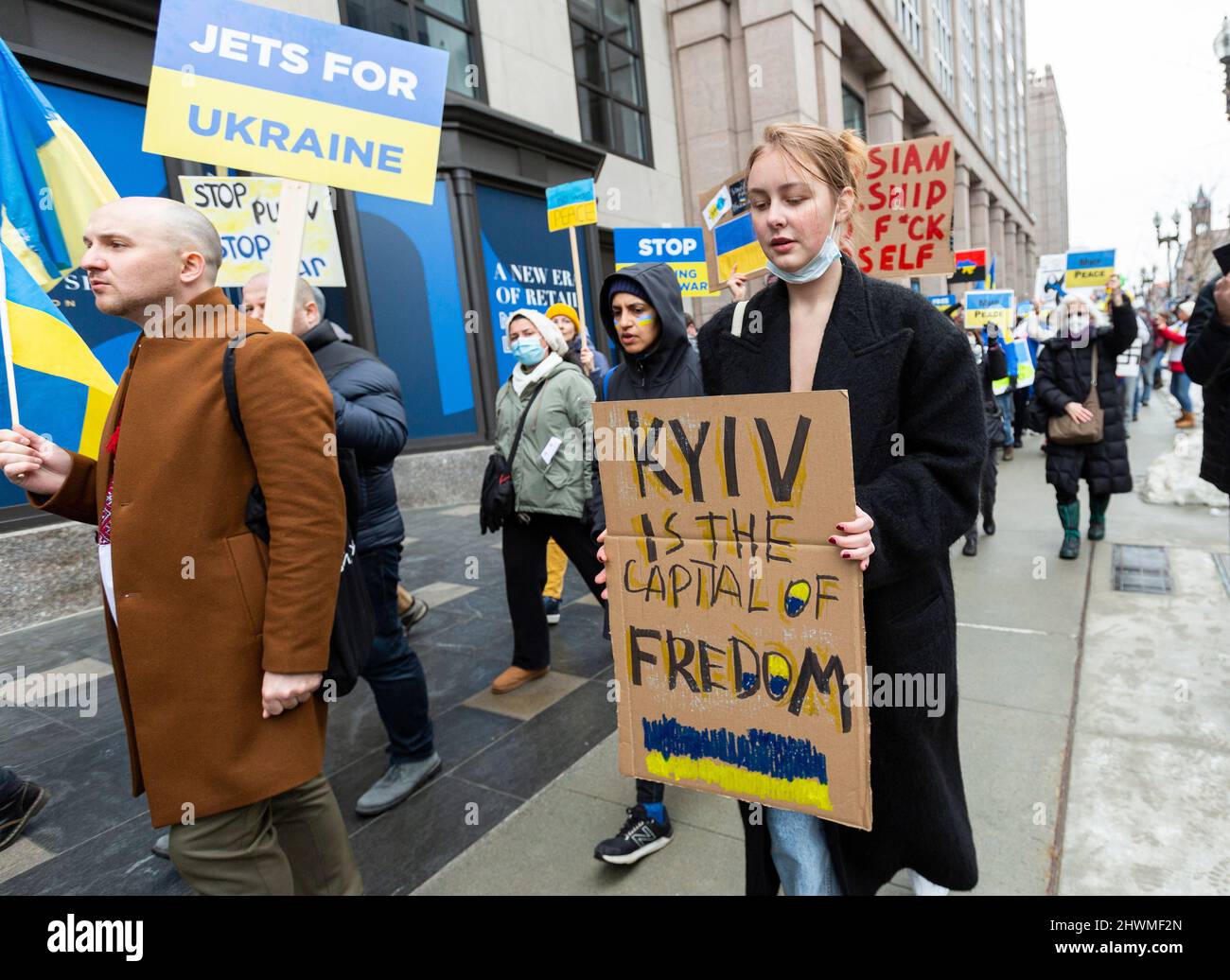 March 6, 2022. Boston, MA. People marched down Boylston Street in ...