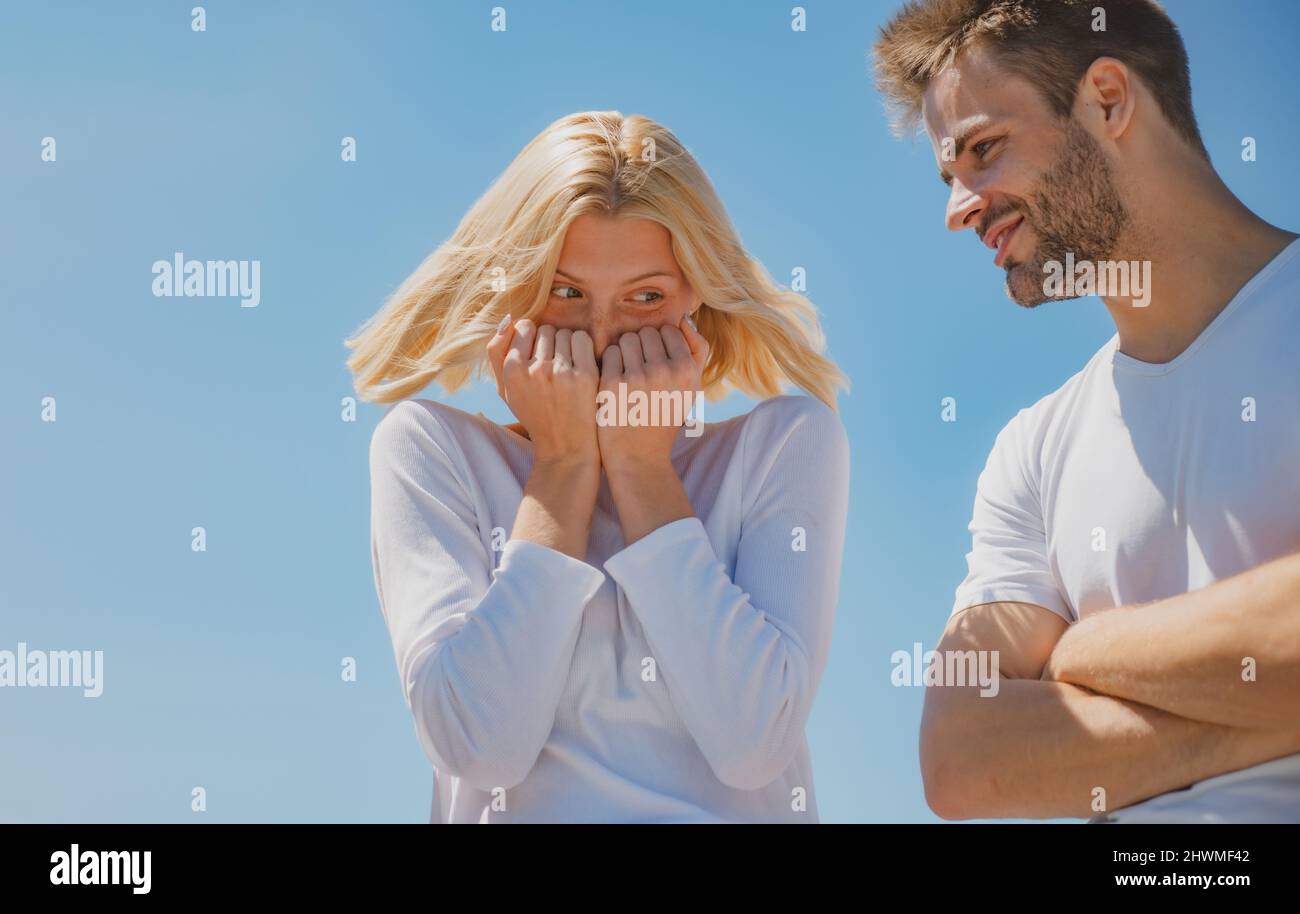 Young embarrassed lovers. Funny face. Declaration of love. Embarrassed ...