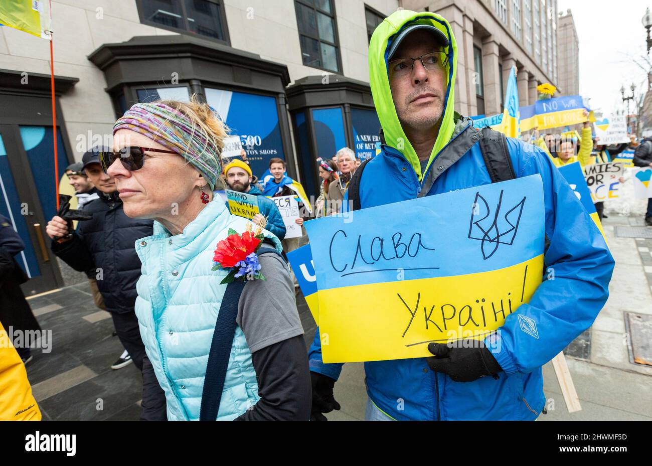 March 6, 2022. Boston, MA. People marched down Boylston Street in ...