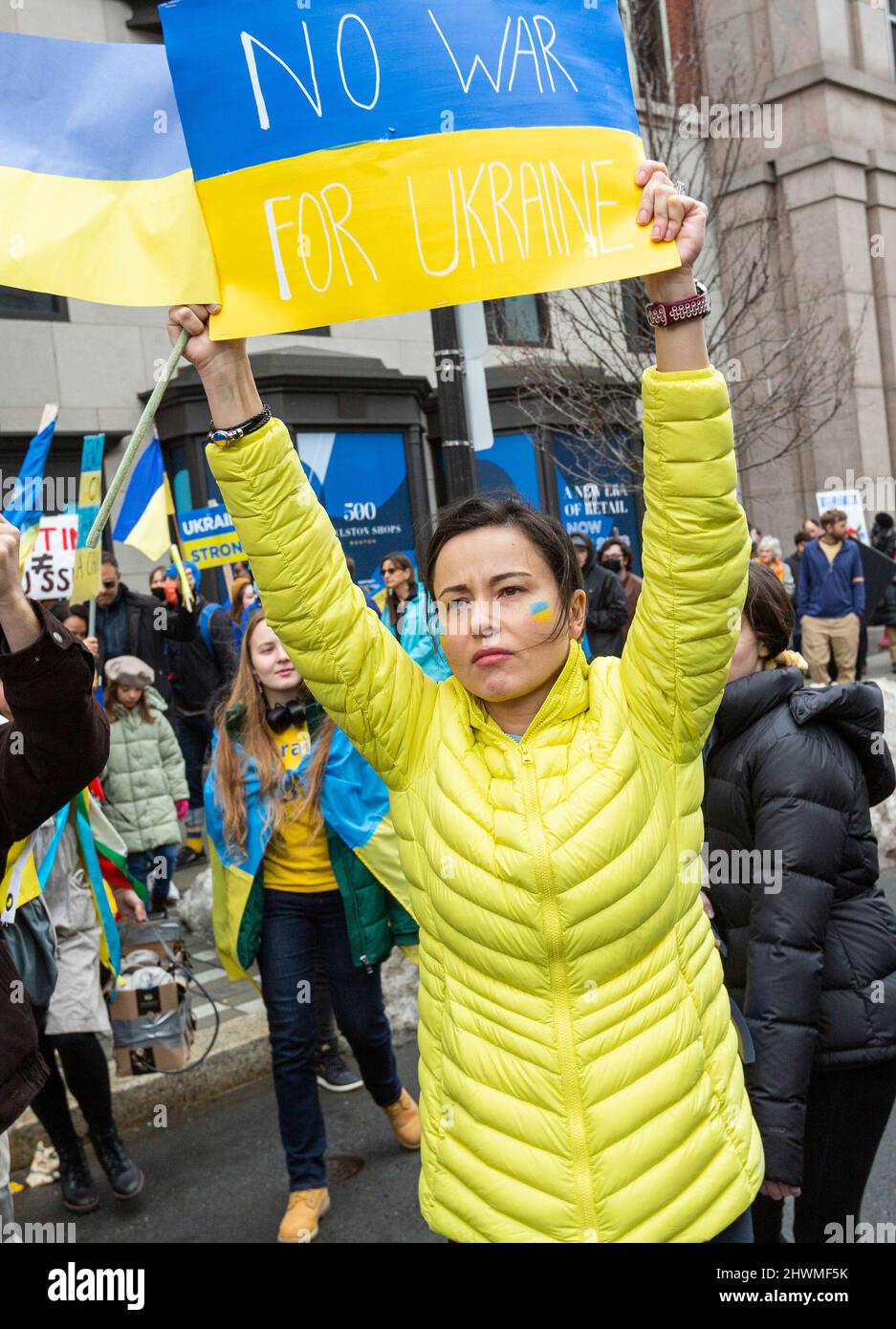 March 6, 2022. Boston, MA. People marched down Boylston Street in ...