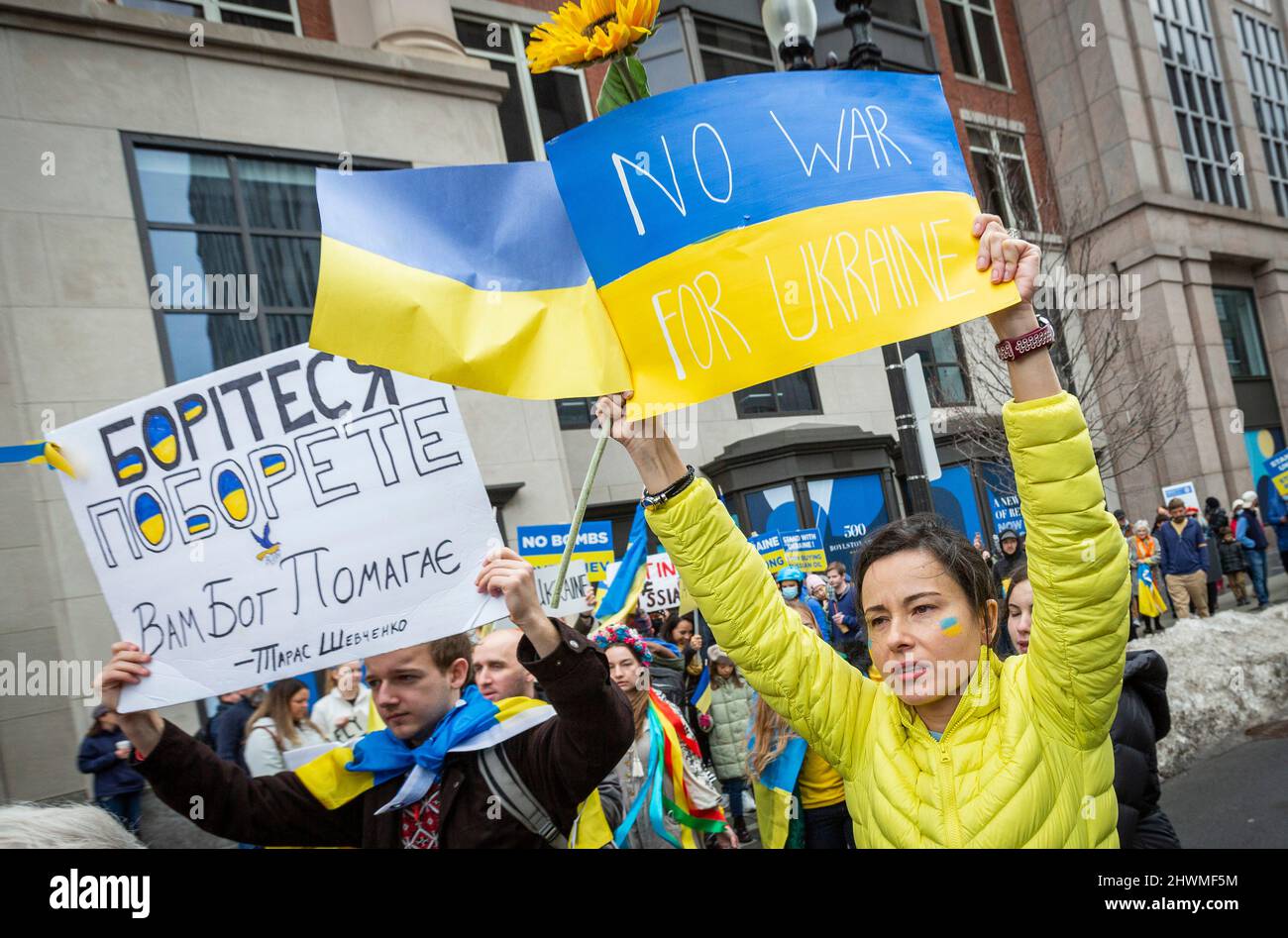 March 6, 2022. Boston, MA. People marched down Boylston Street in ...