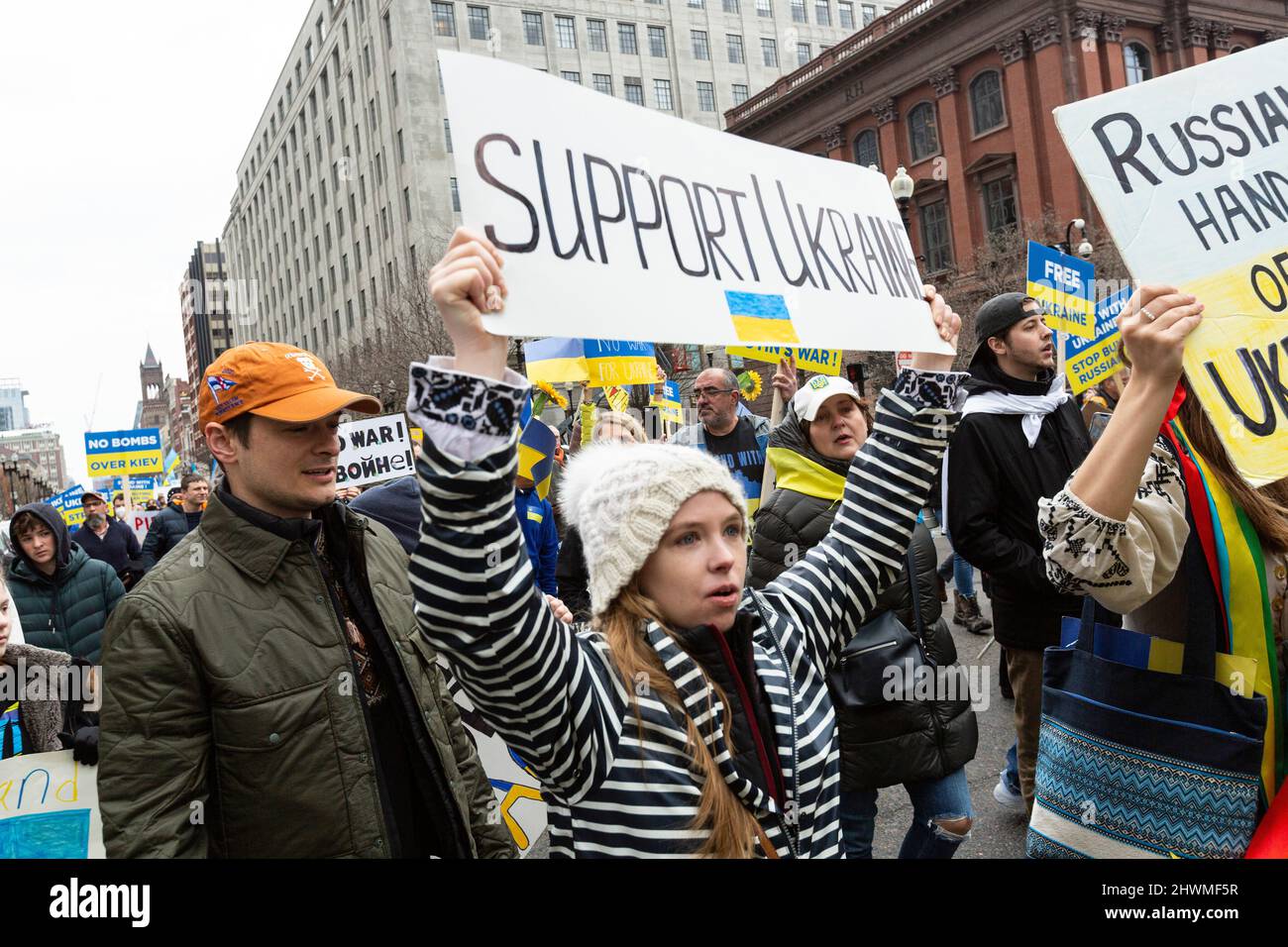 March 6, 2022. Boston, MA. People marched down Boylston Street in ...