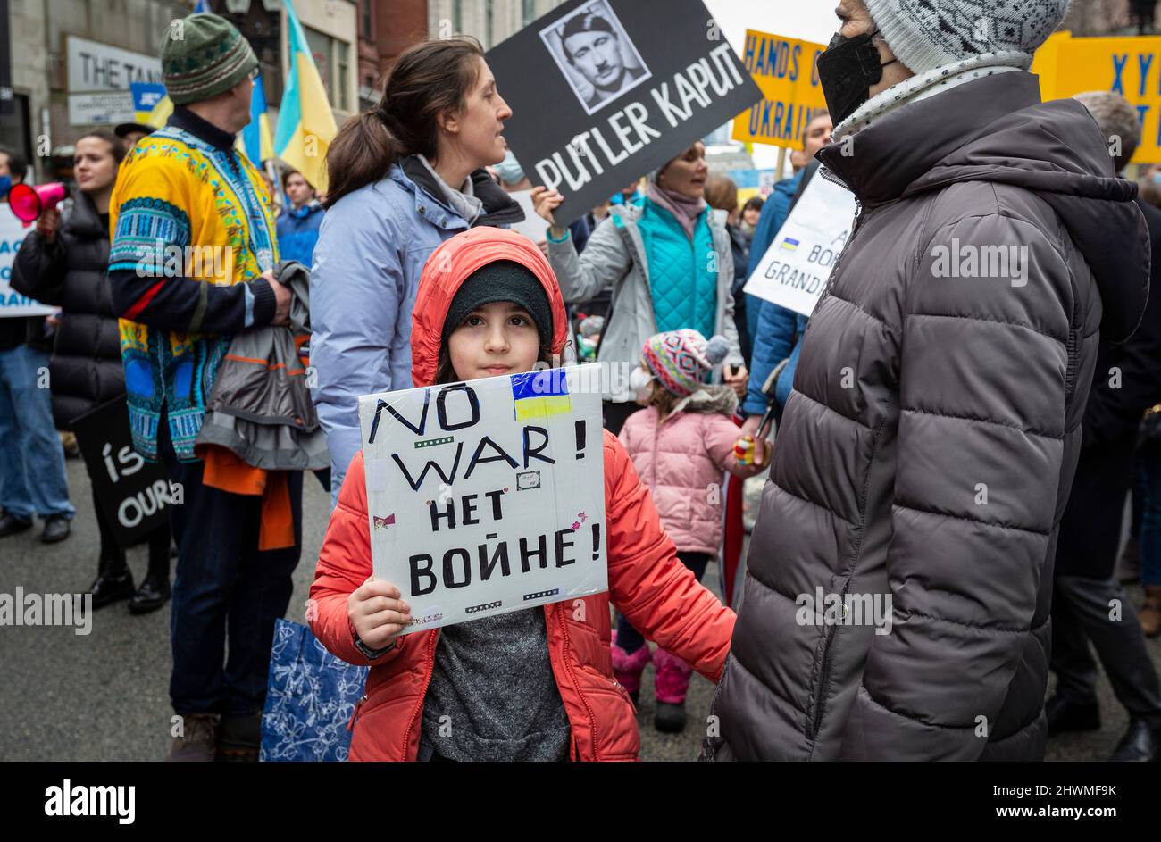 March 6, 2022. Boston, MA. People marched down Boylston Street in ...